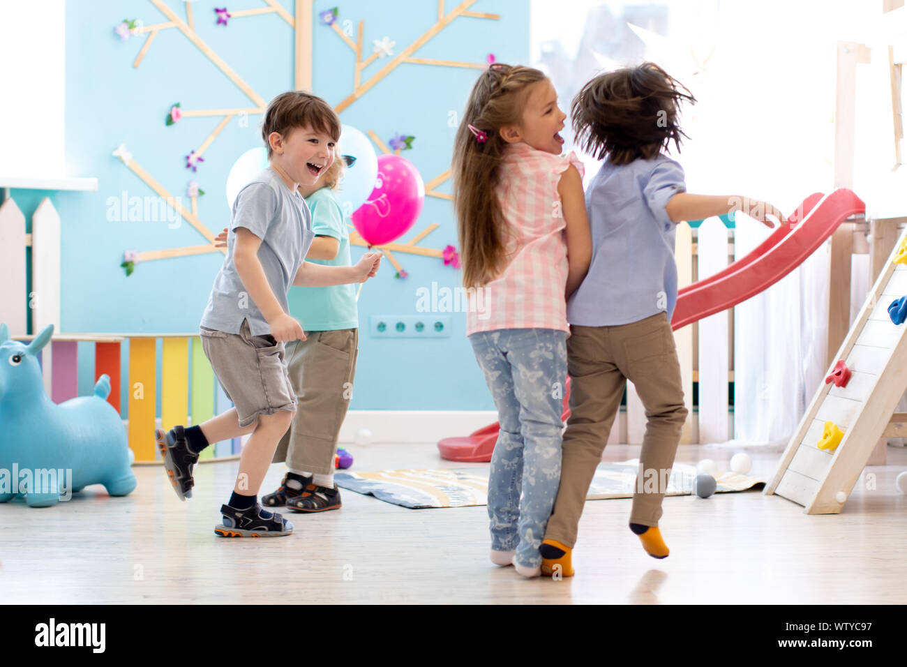 Active kindergarten children running hi-res stock photography and ...