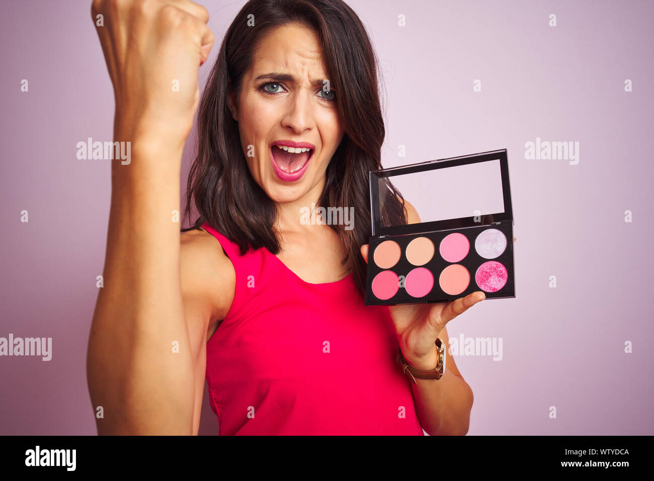 Applying makeup angry hi-res stock photography and images - Alamy