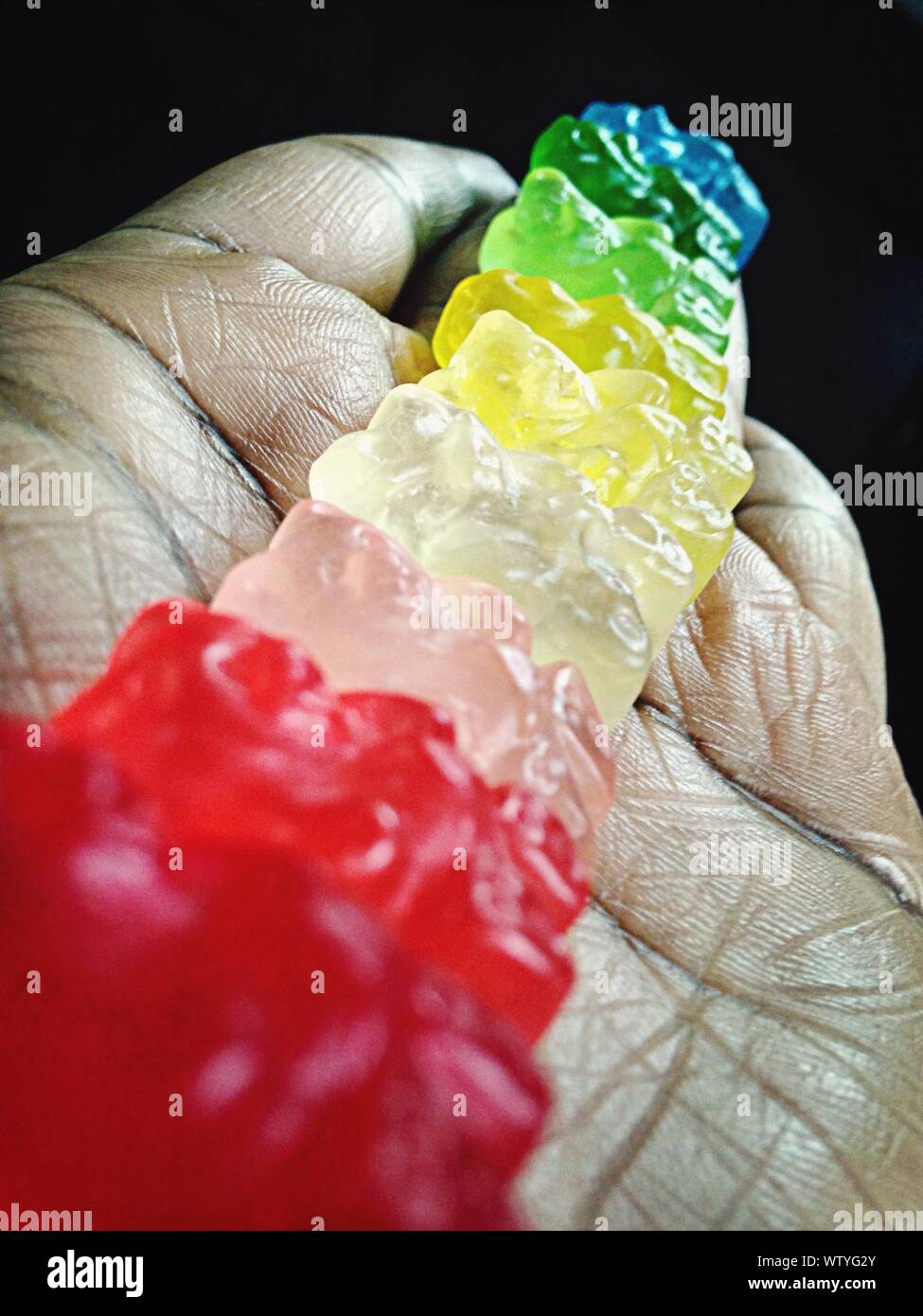 Gummy bears and hand High Resolution Stock Photography and Images - Alamy