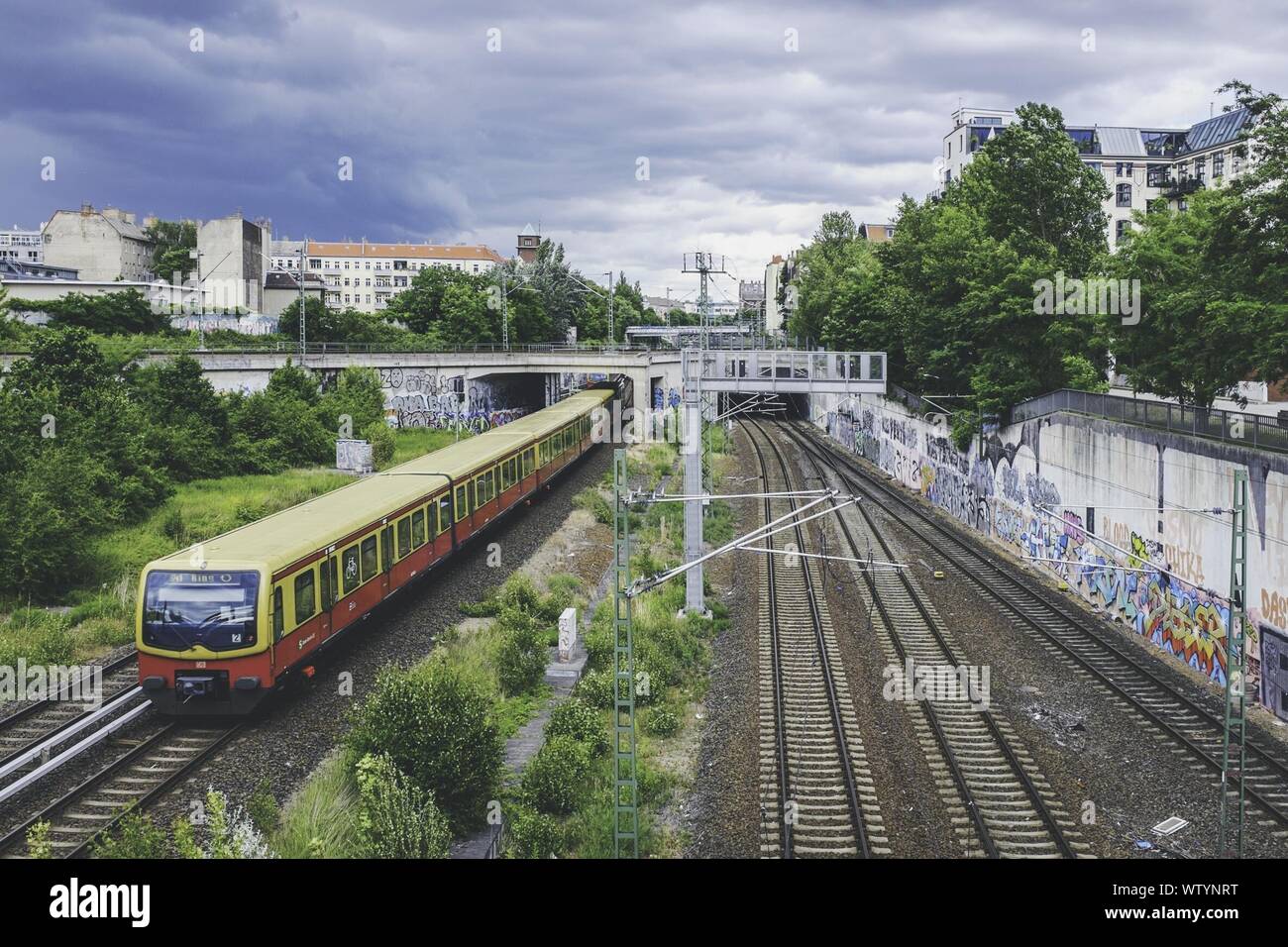Train passing under the bridge hi-res stock photography and images - Alamy