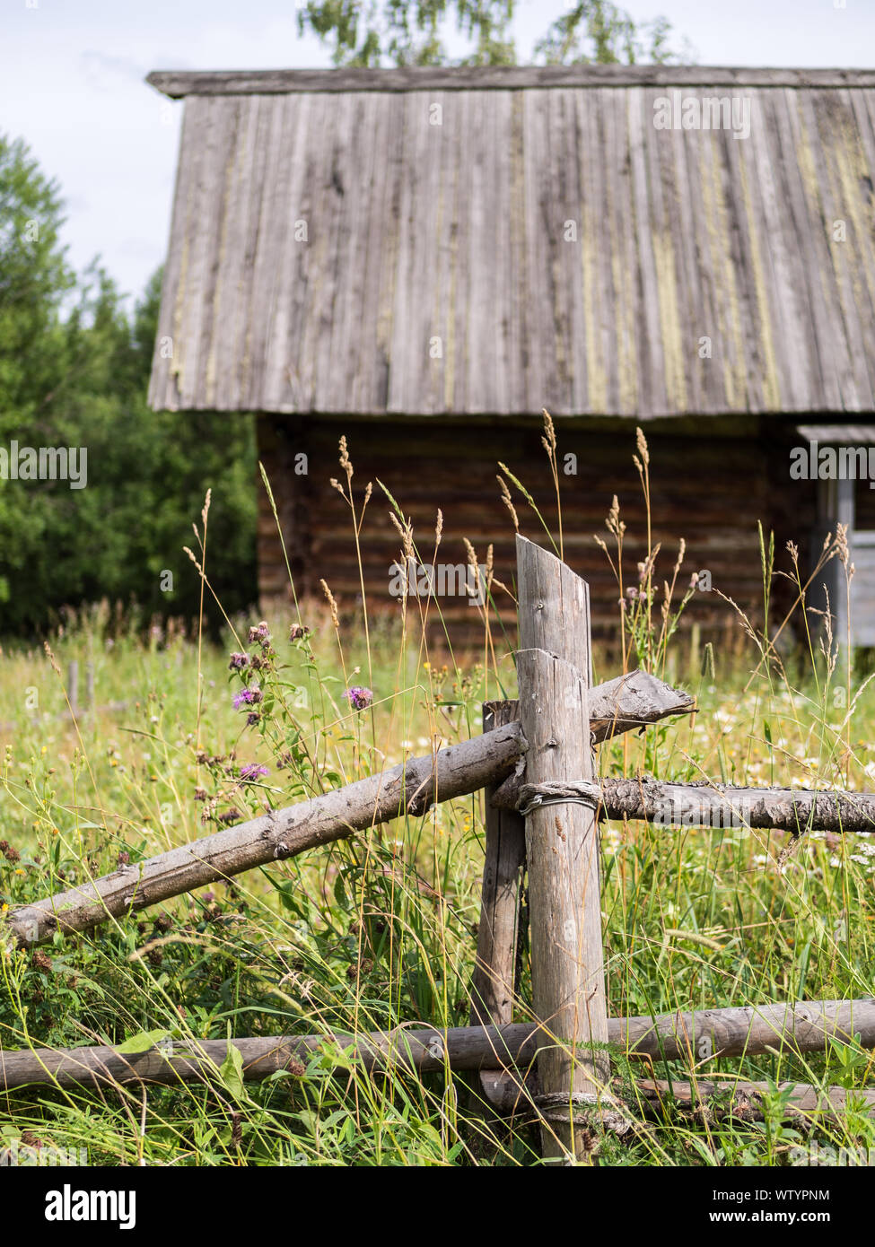 Rural landscape with elements of wooden architecture Stock Photo - Alamy