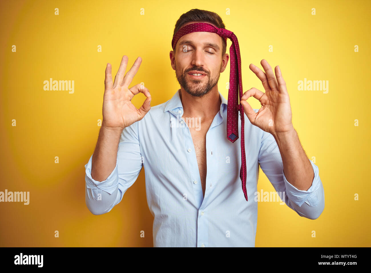 Hangover business man drunk and crazy for hangover wearing tie on head ...