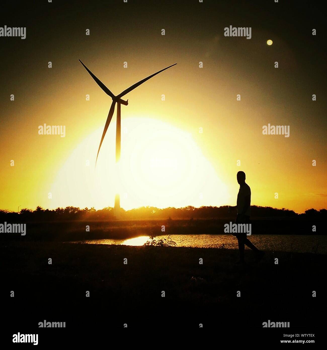 People Wind Energy Silhouette High Resolution Stock Photography and ...