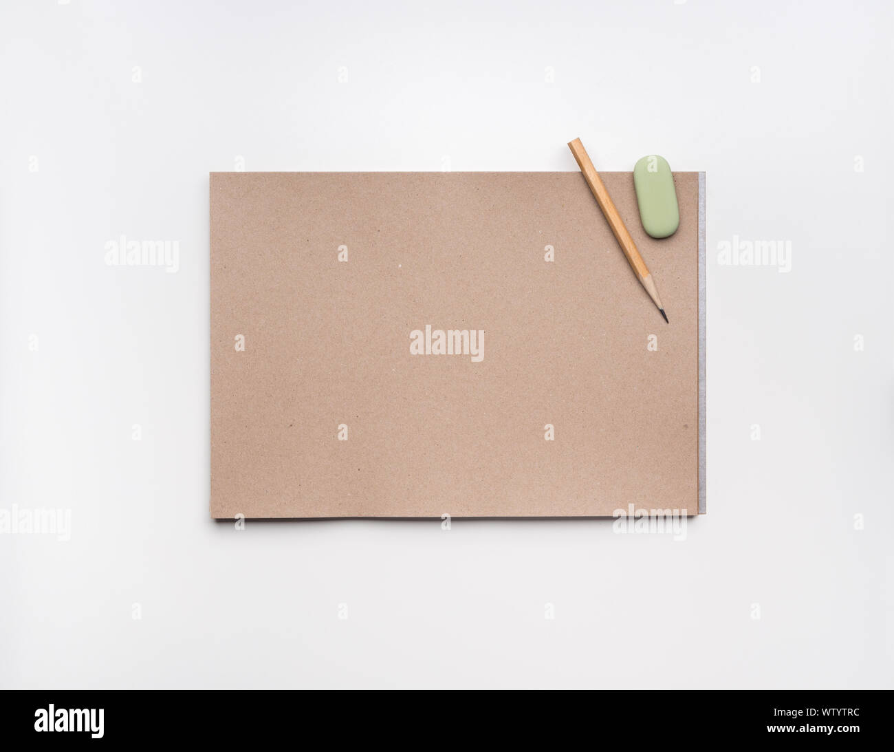 Craft paper sketchbook with various art tools. Flat view Stock Photo ...
