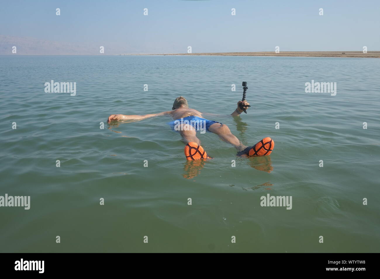 The Dead Sea is a salt lake bordered by Jordan to the east and Israel ...