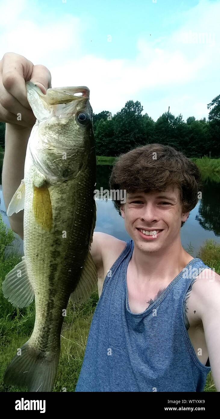 Men with caught fish hi-res stock photography and images - Alamy