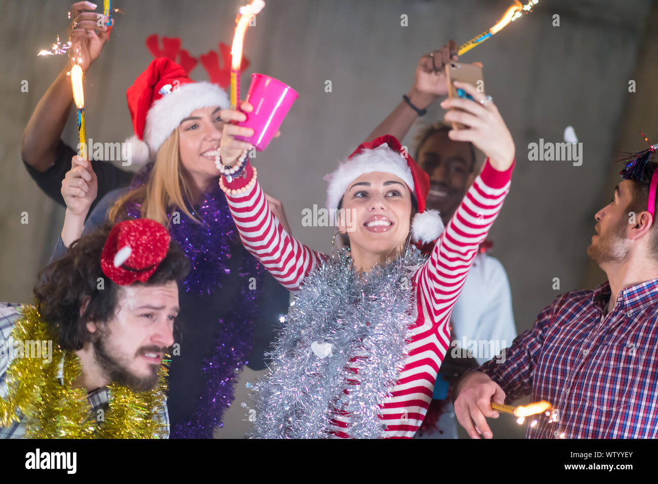 multiethnic group of young happy casual business people taking selfie ...