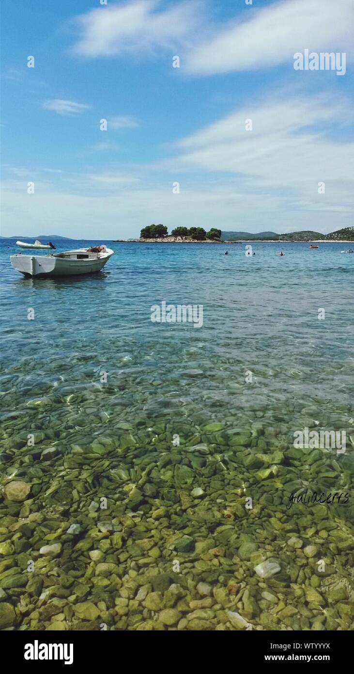 Boat floating on sea hi-res stock photography and images - Alamy