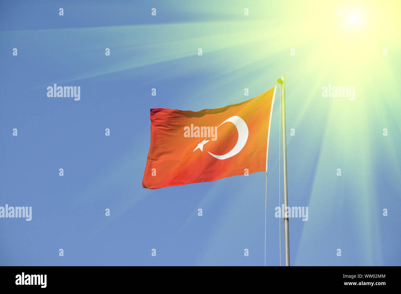 National state symbols. Flag of Turkey on a background of blue sky ...