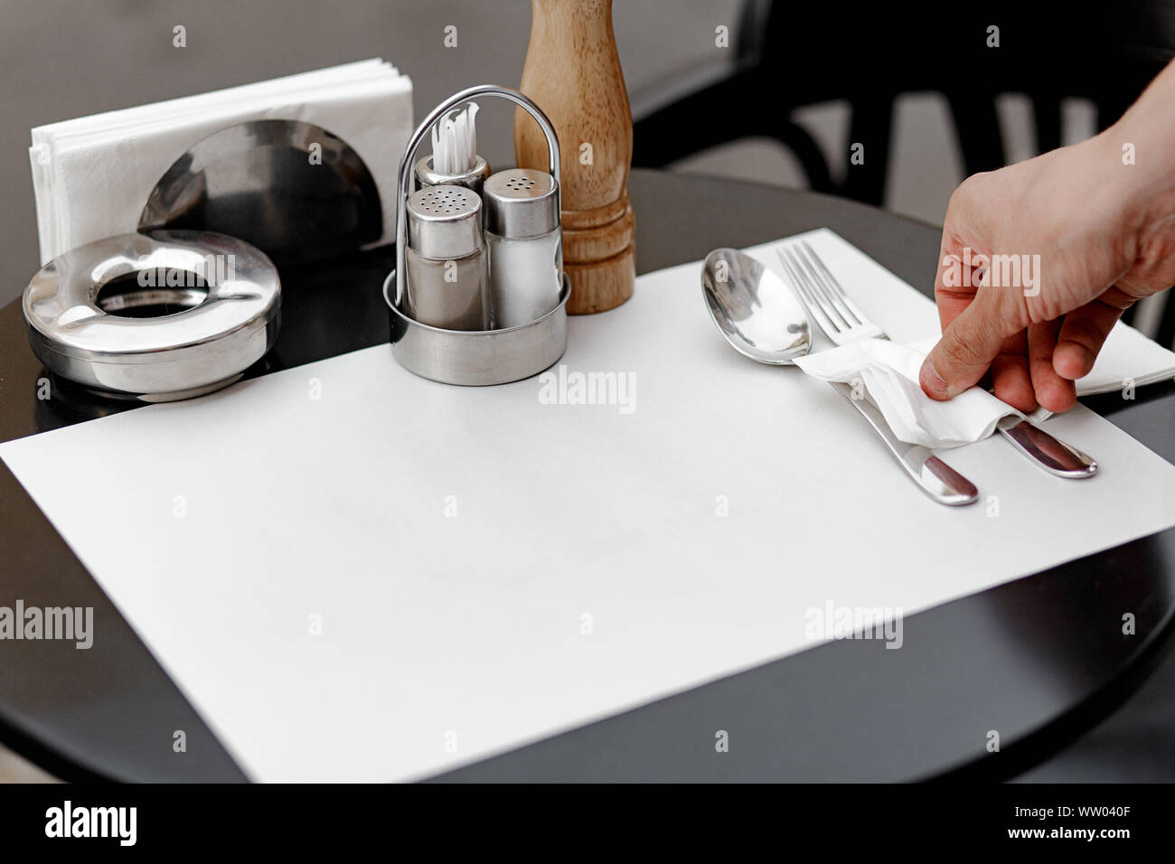 Man Setting The Table
