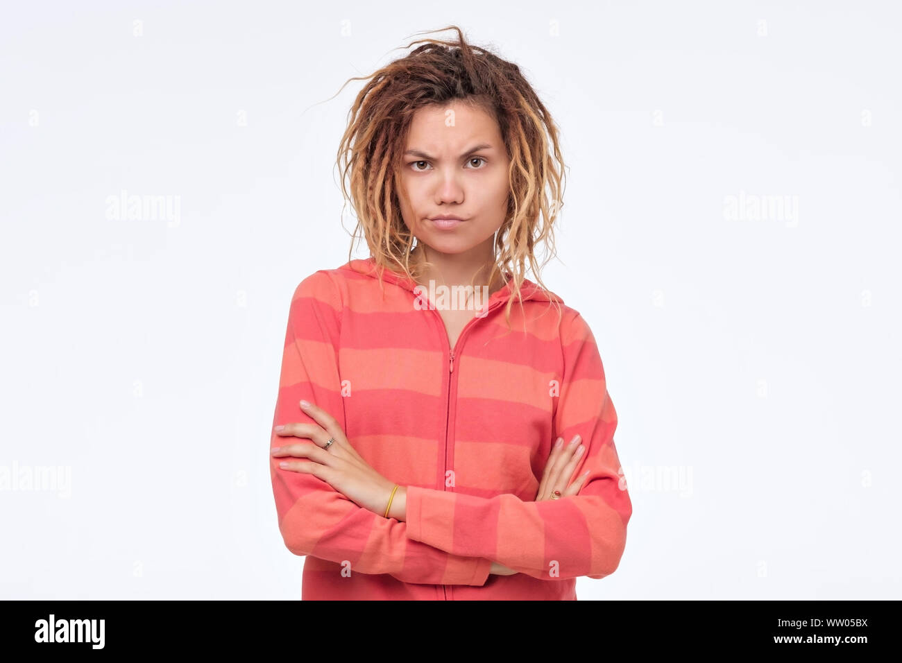 annoyed asian woman with crossed arms frowning face in disgust isolated ...