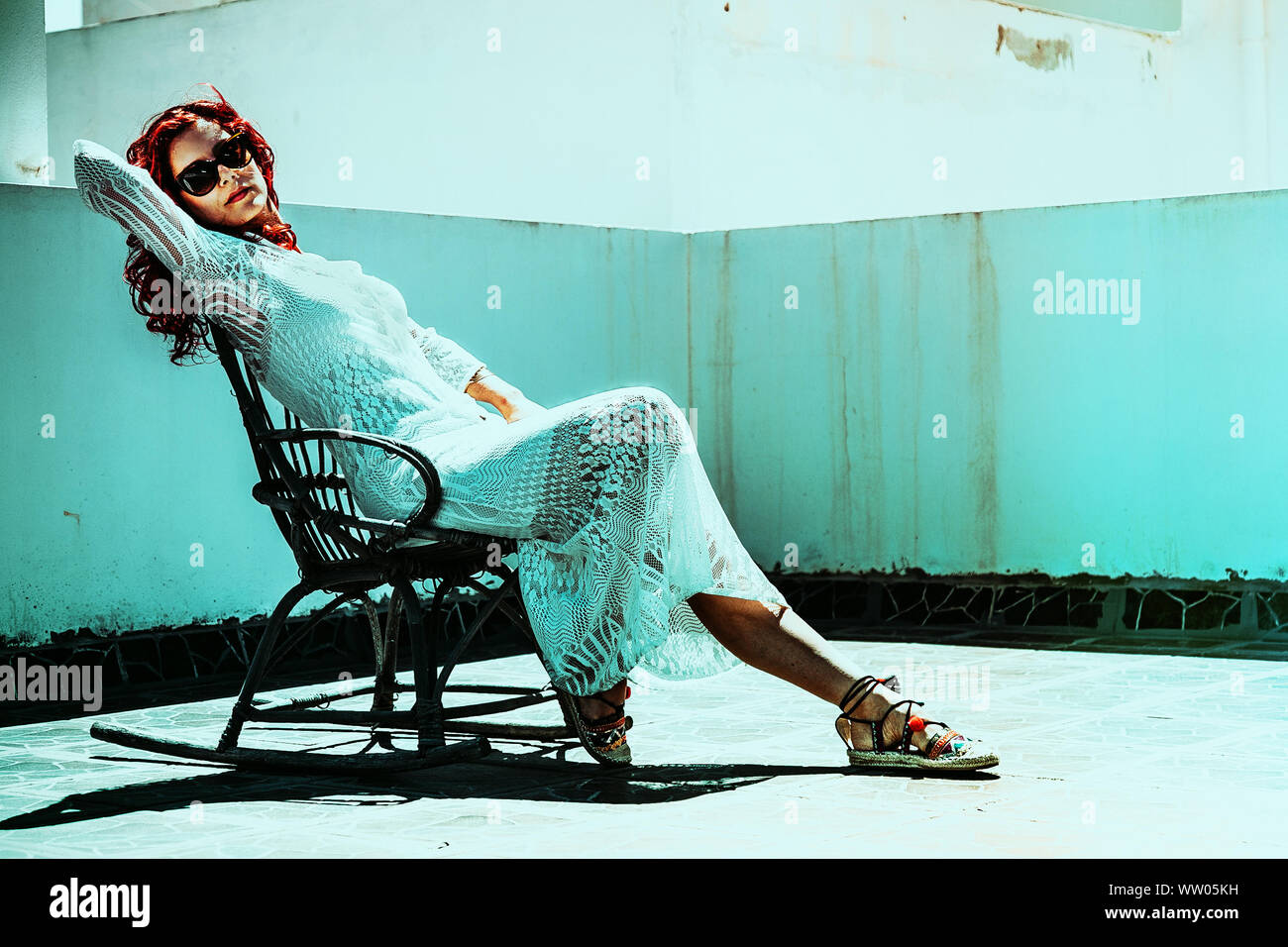 Woman Sitting On Rocking Chair High Resolution Stock Photography and ...