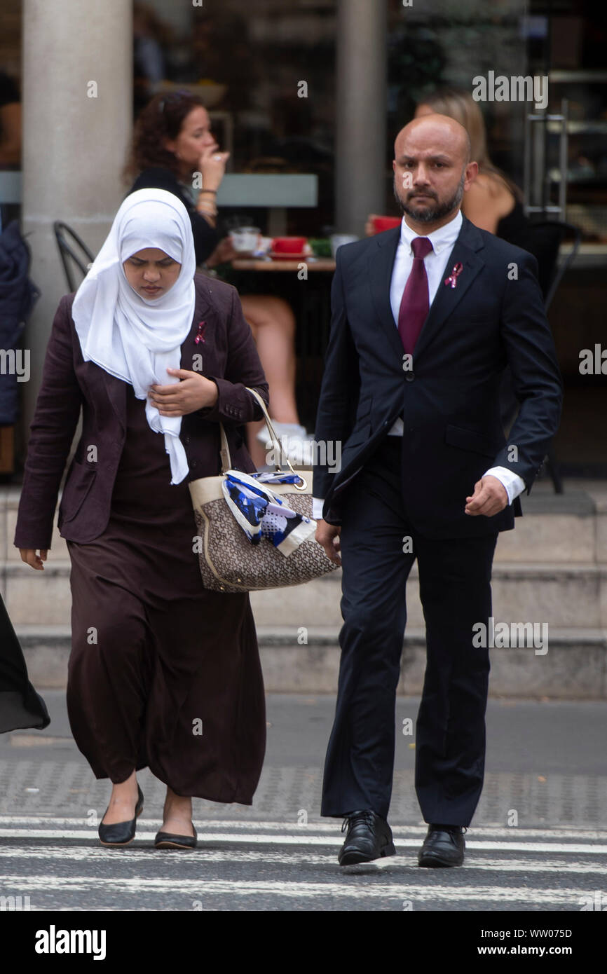 Shelina Begum (left) and husband Mohammed Raqeeb arrive at the Royal Courts of Justice in London ...