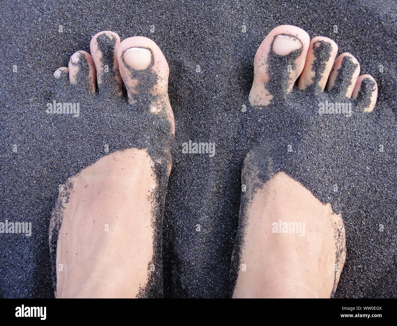 Barefoot in the sand hi-res stock photography and images - Alamy