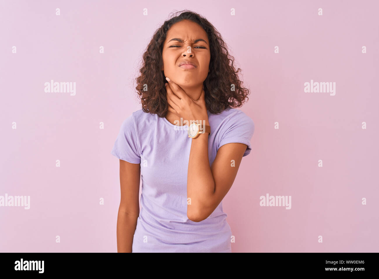 Young Brazilian Woman Wearing T Shirt Standing Over Isolated Pink
