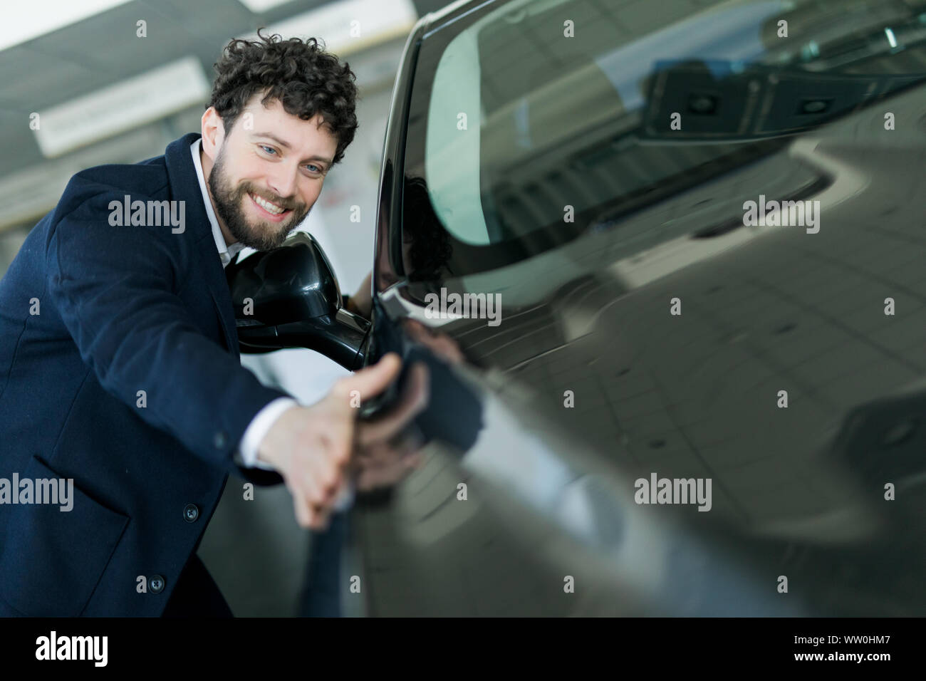 Young black man buying car hi-res stock photography and images - Alamy
