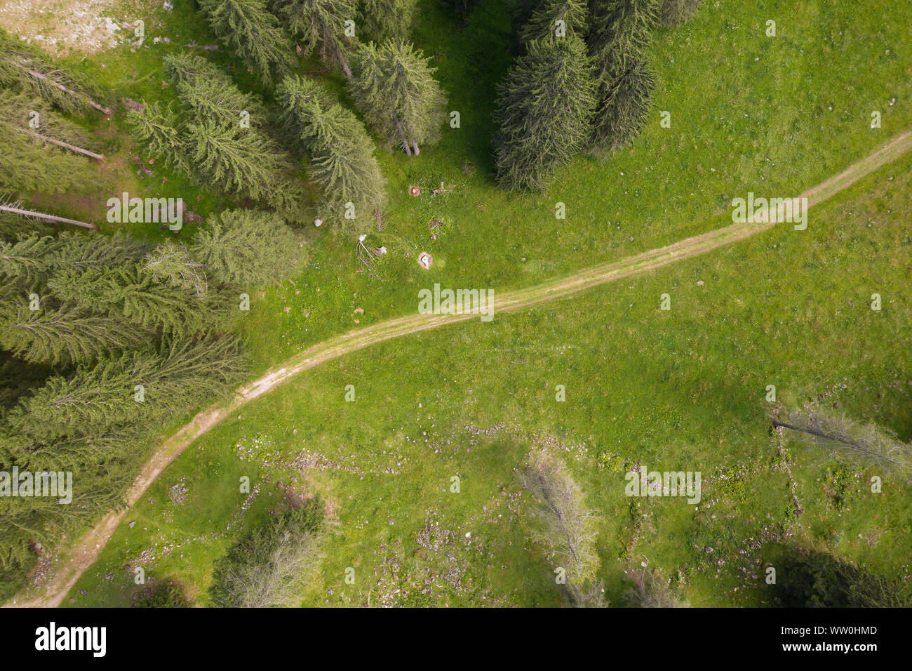 photo taken from above with drone of a mountain path that crosses a ...