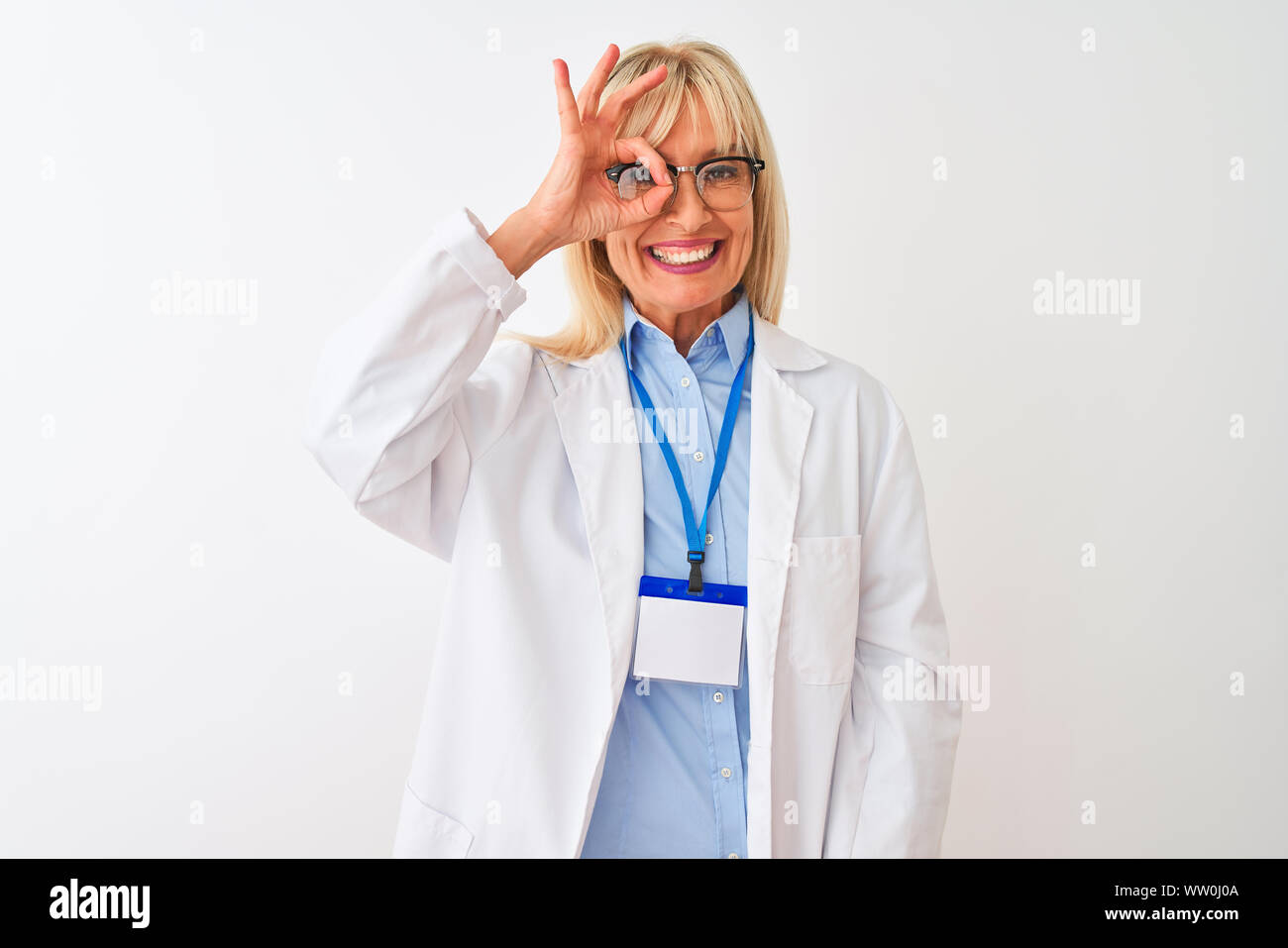 Middle age scientist woman wearing glasses and id card over isolated ...