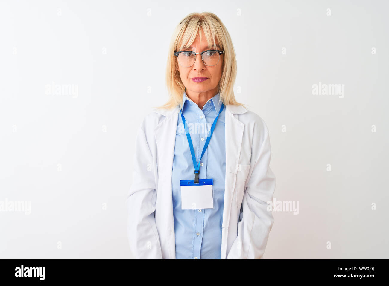 Middle age scientist woman wearing glasses and id card over isolated ...