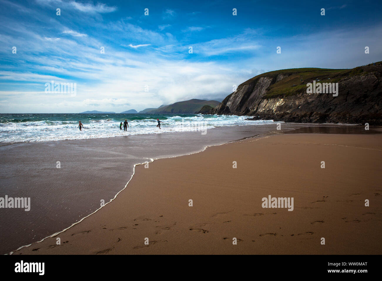 People on Coumeenoole Beach, Slea Head, Dingle Peninsula, Kerry ...