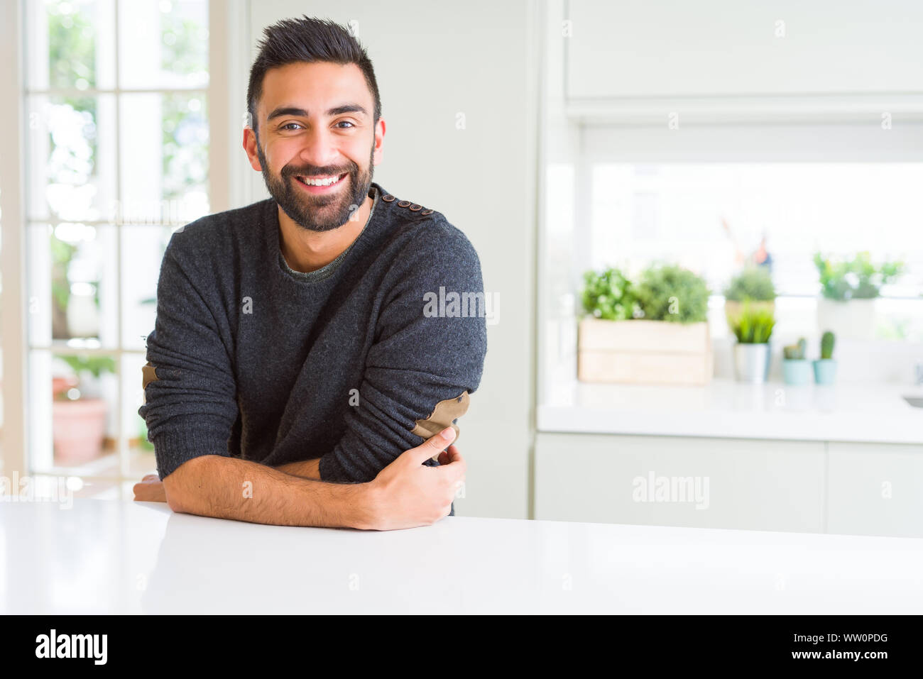 Handsome man smiling cheerful with a big smile on face showing teeth ...