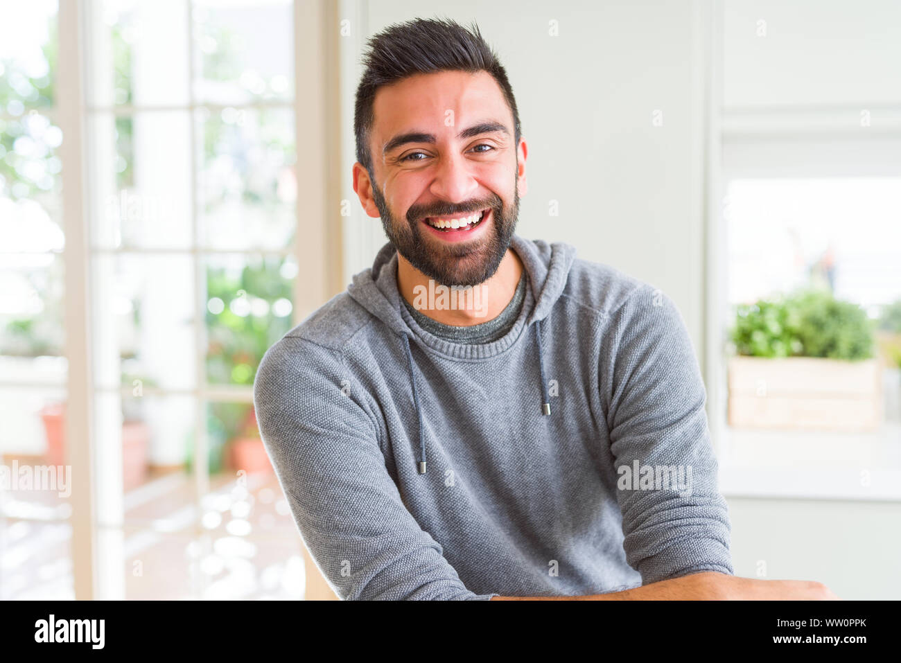 Handsome man smiling cheerful with a big smile on face showing teeth ...