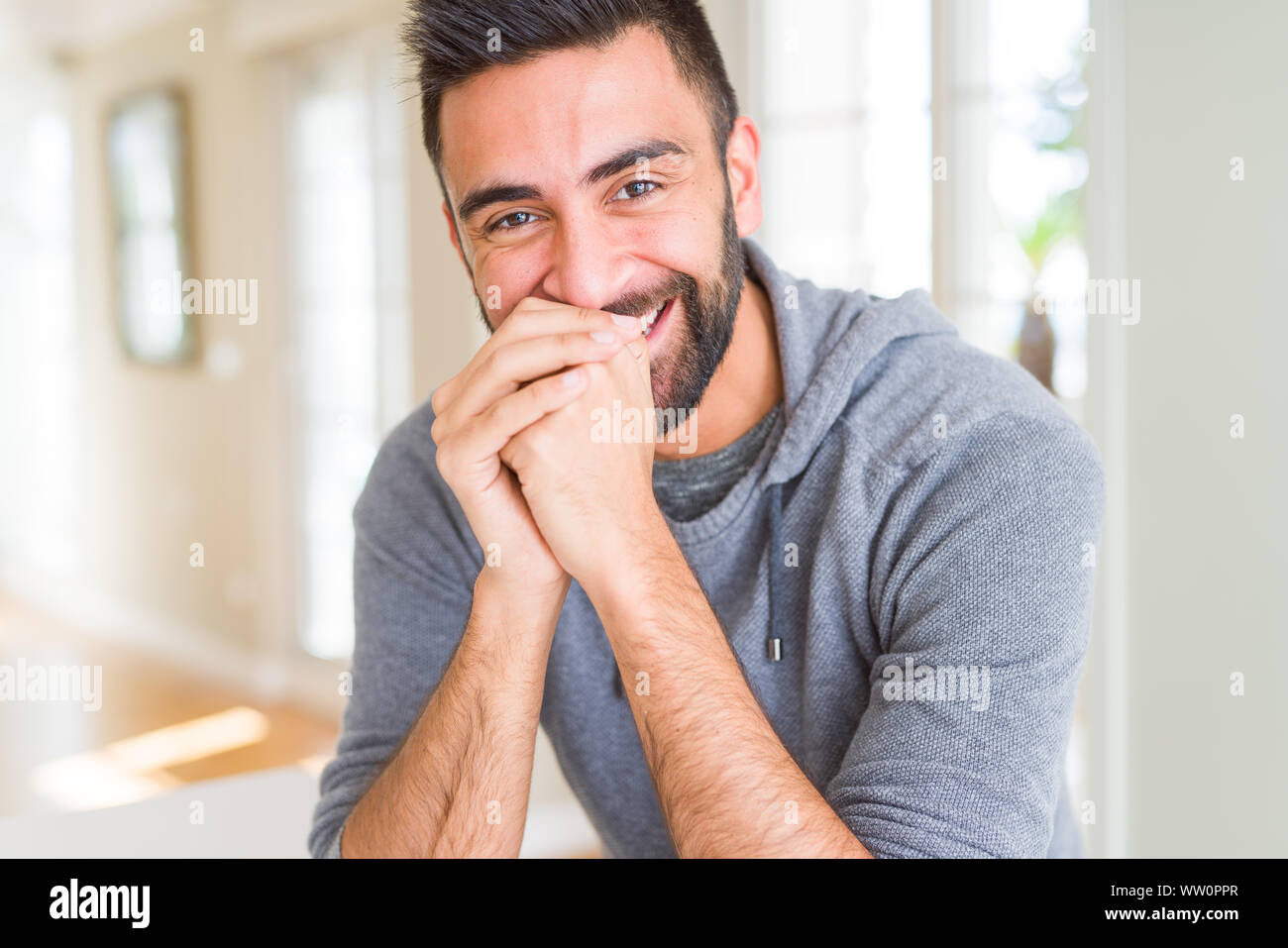 Handsome man smiling cheerful with a big smile on face showing teeth ...