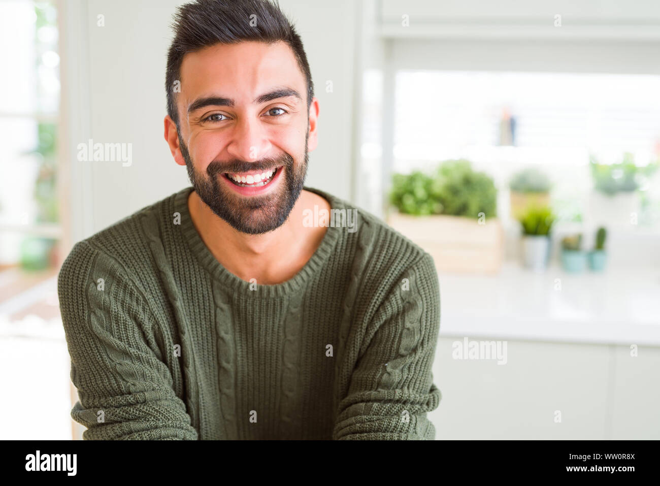 Handsome man smiling cheerful with a big smile on face showing teeth ...