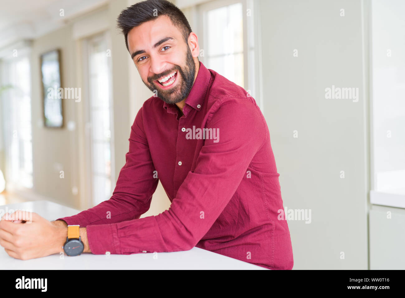 Handsome man smiling cheerful with a big smile on face showing teeth ...