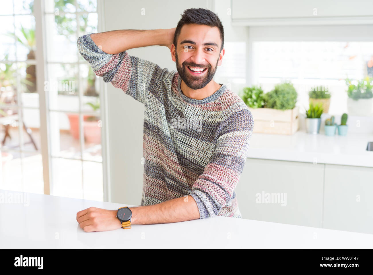 Handsome man smiling cheerful with a big smile on face showing teeth ...