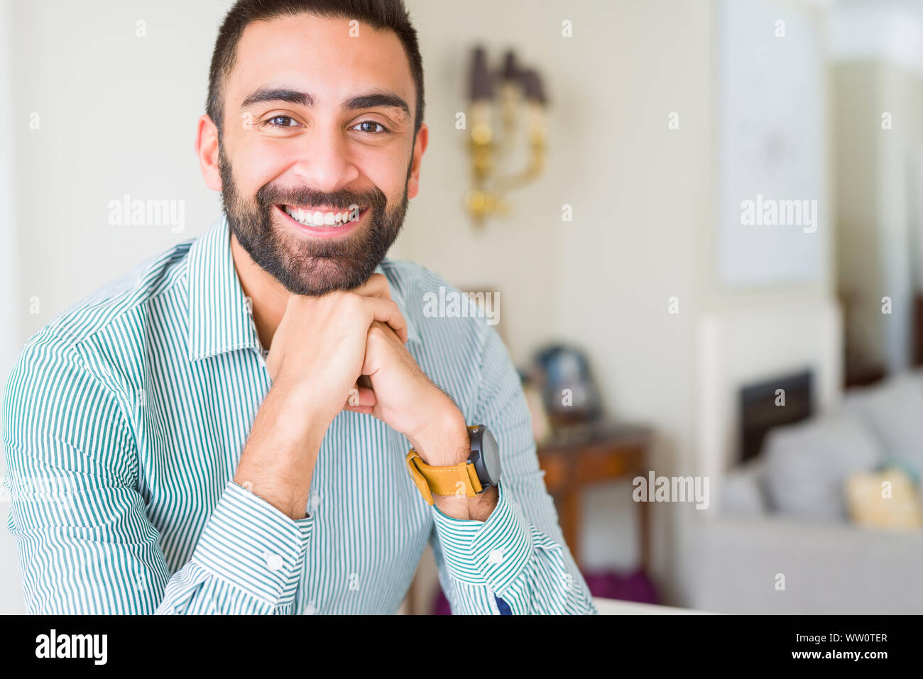 Handsome man smiling cheerful with a big smile on face showing teeth ...