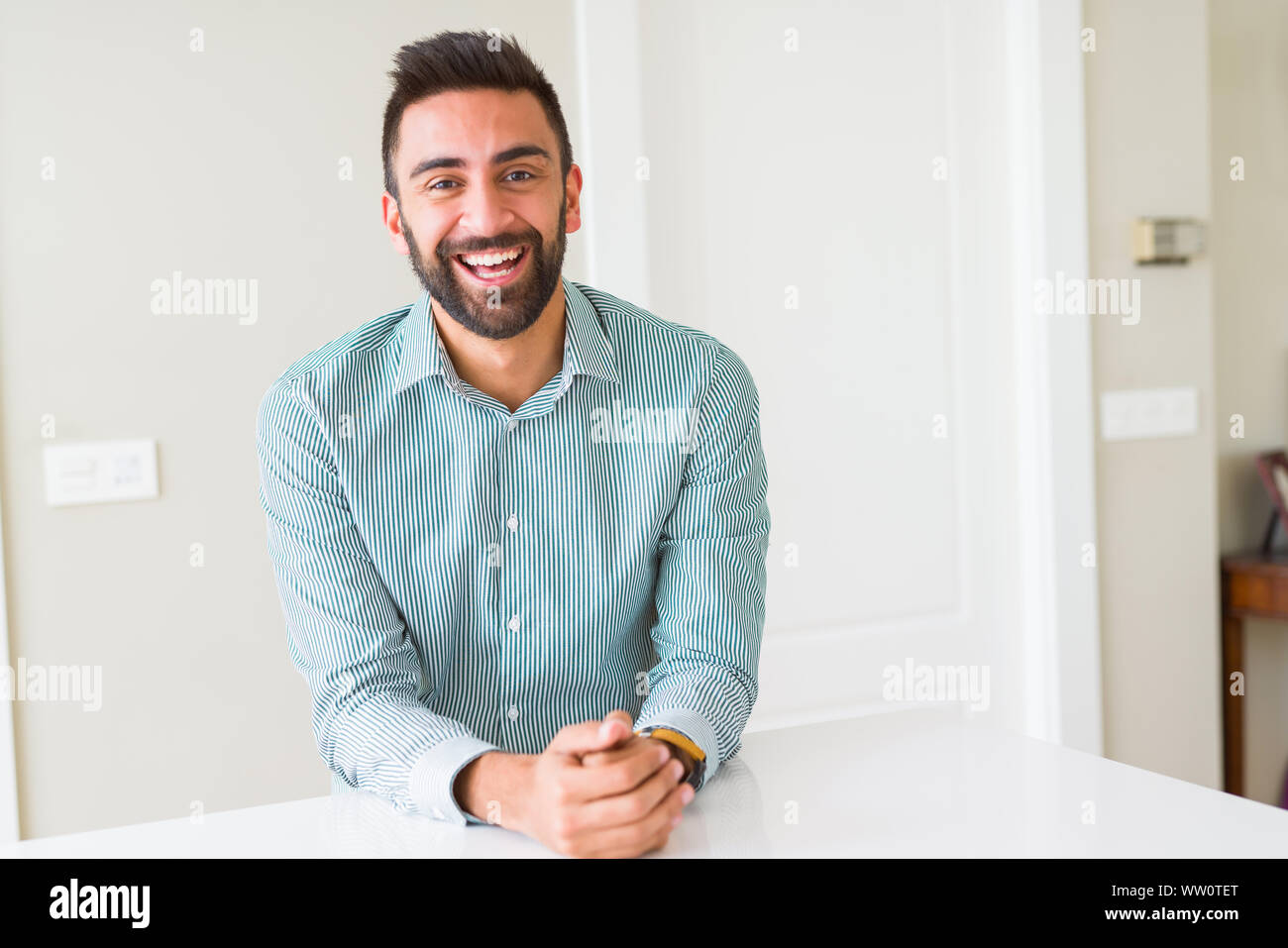 Handsome man smiling cheerful with a big smile on face showing teeth ...