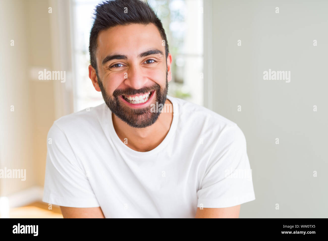 Handsome man smiling cheerful with a big smile on face showing teeth ...