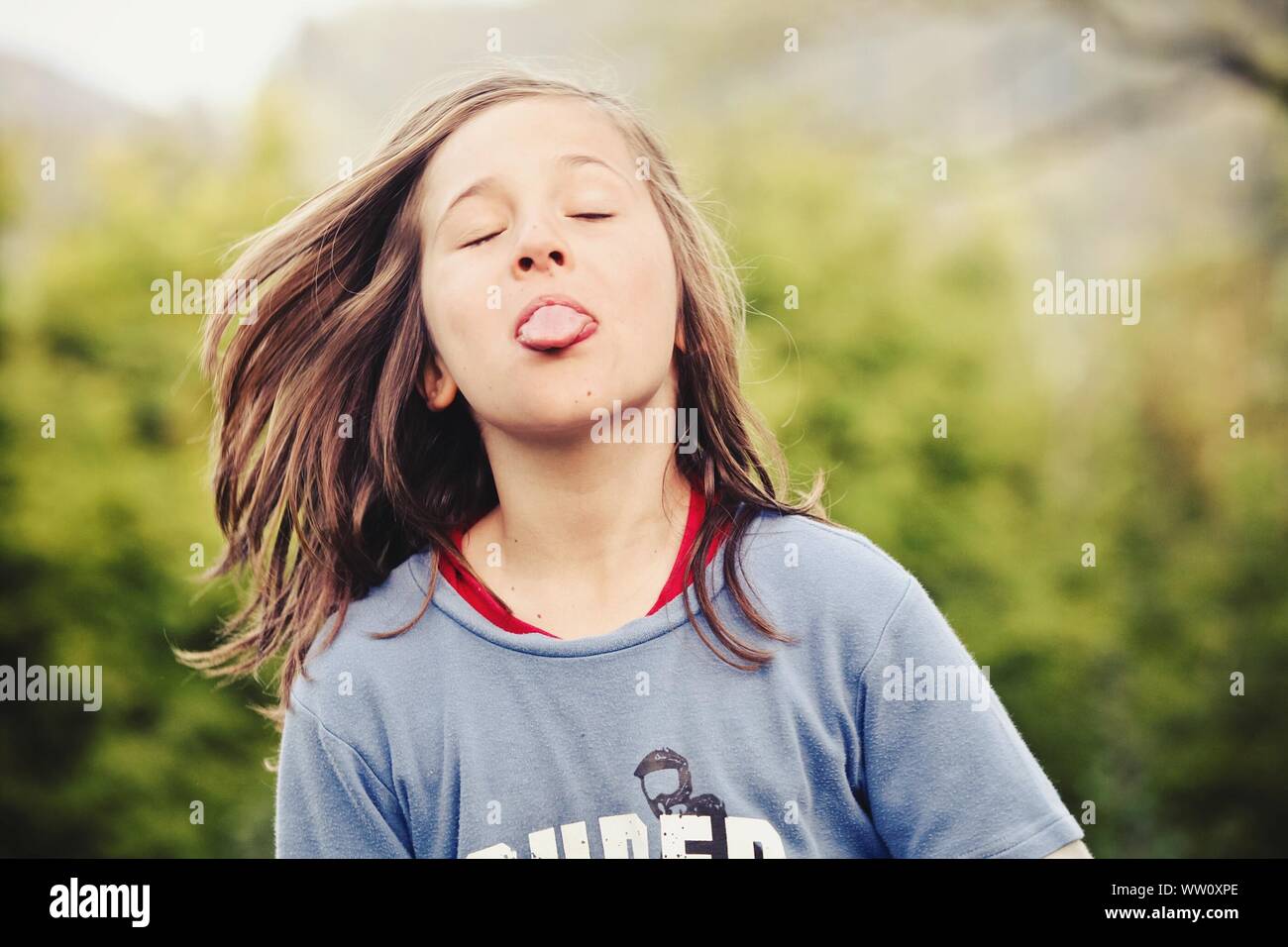 Child with tongue out hi-res stock photography and images - Alamy