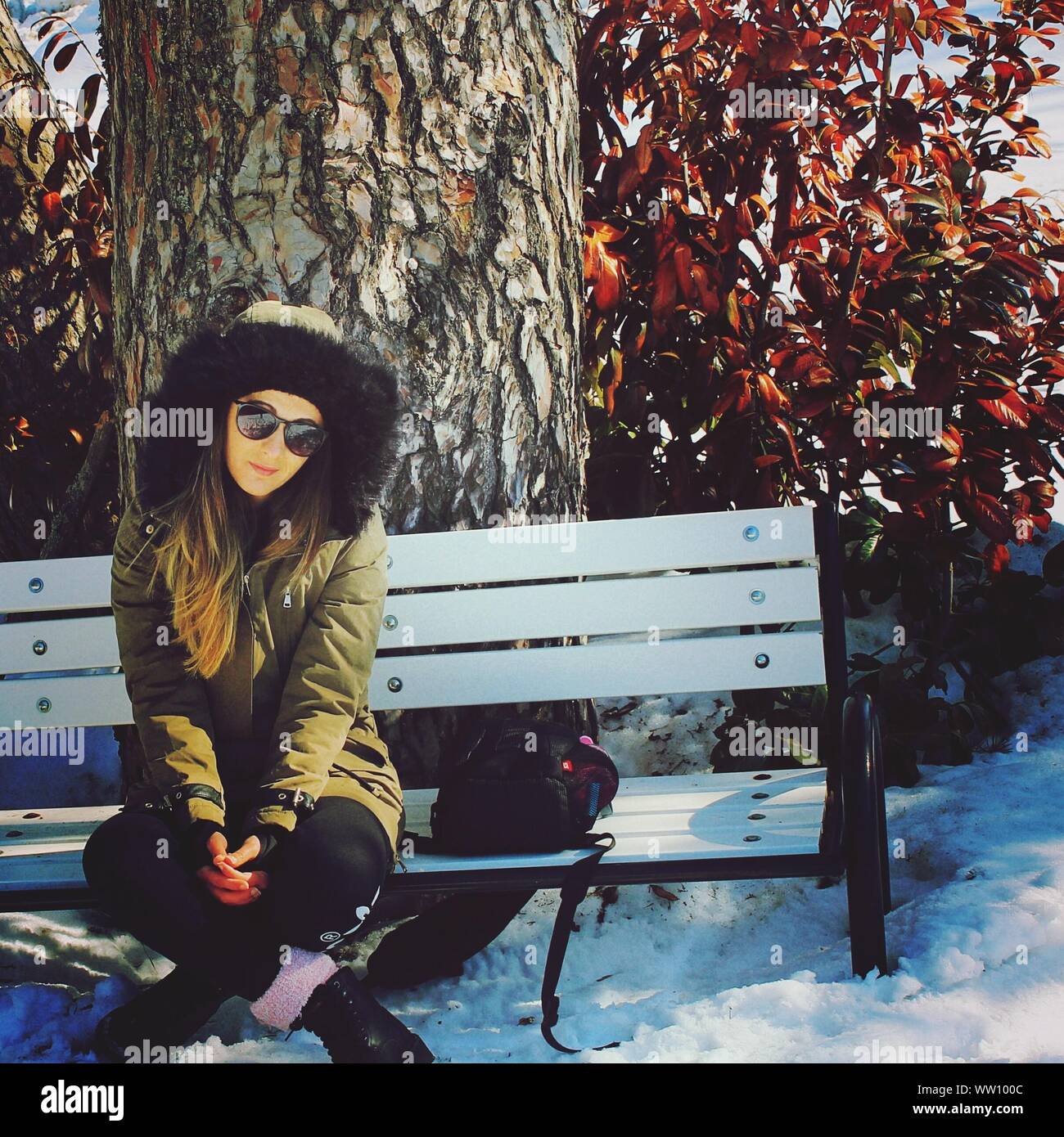 Woman Sitting Against Tree Trunk High Resolution Stock Photography and ...