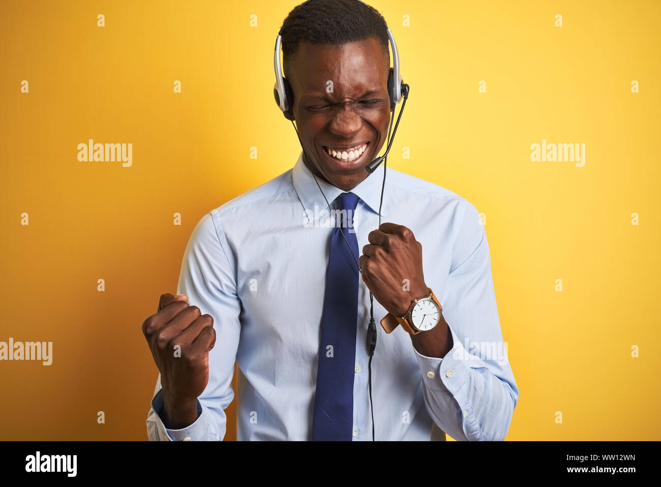 African american operator man working using headset over isolated ...