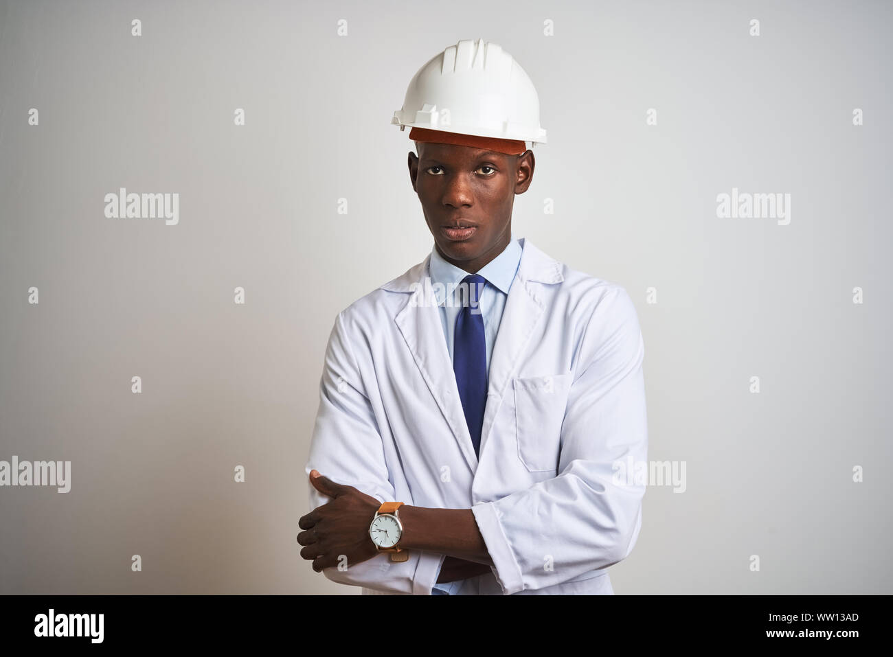 African american engineer man wearing coat and helmet over isolated ...
