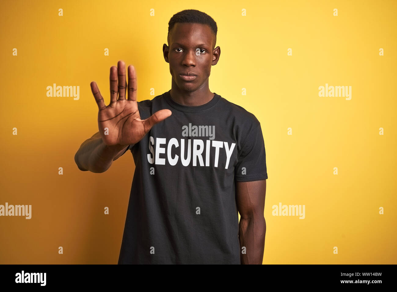African american safeguard man wearing security uniform over isolated ...
