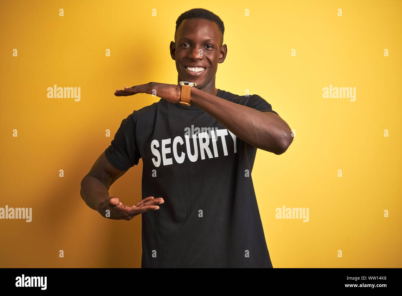 African american safeguard man wearing security uniform over isolated ...