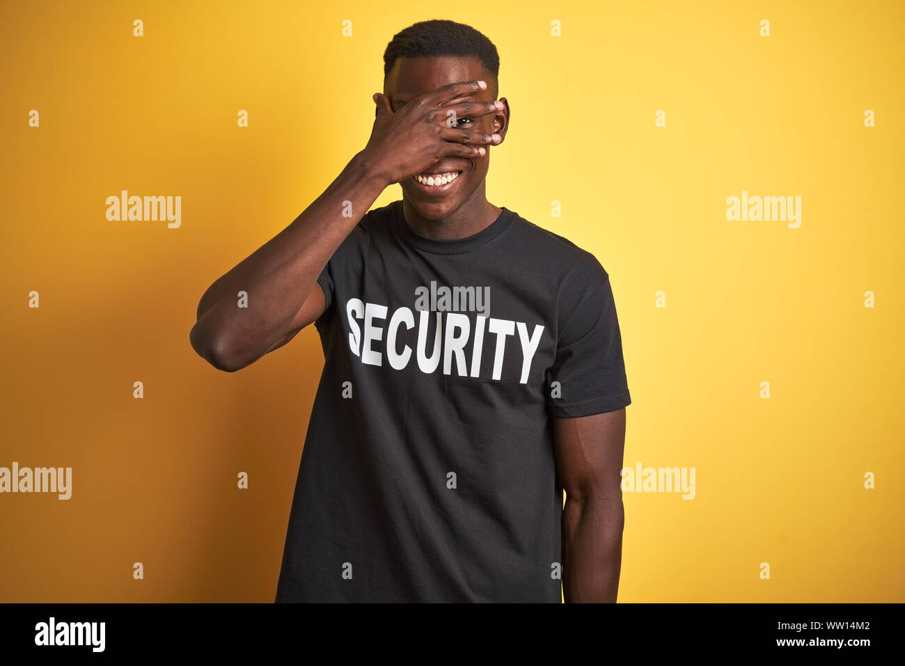 African american safeguard man wearing security uniform over isolated ...