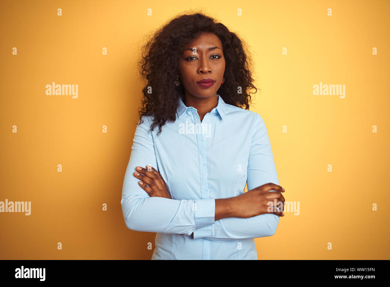 African american businesswoman wearing elegant shirt over isolated ...