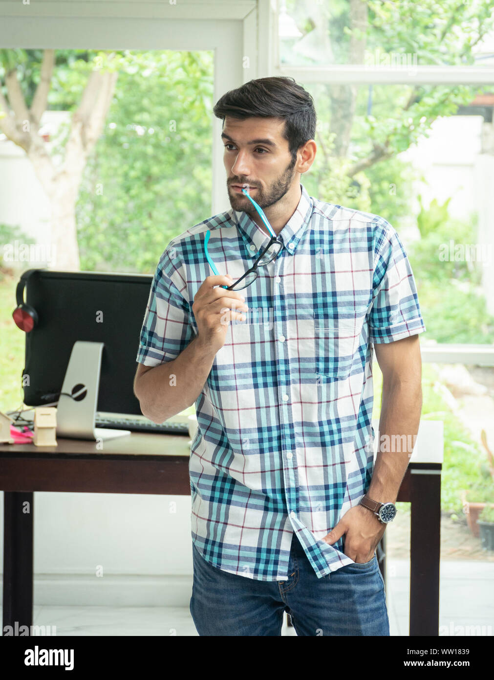 Good looking caucasian man with space background, wearing eye glasses ...