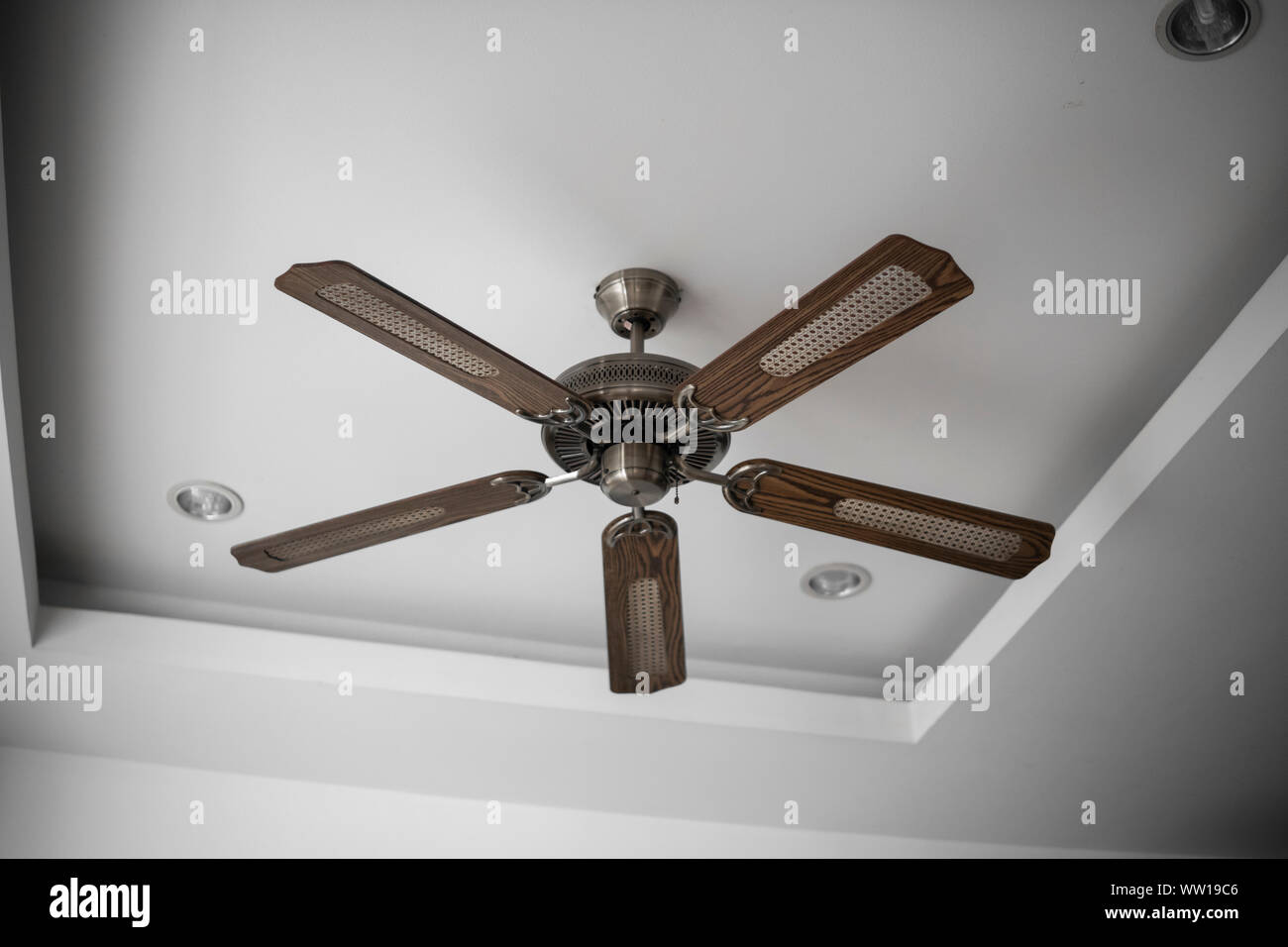 Picture of wooden ceiling fan inside the living room Stock Photo - Alamy