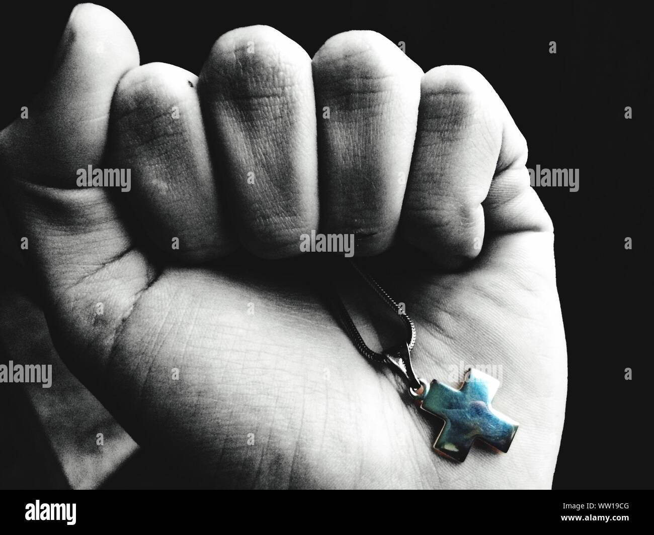 Man cross necklace hi-res stock photography and images - Alamy