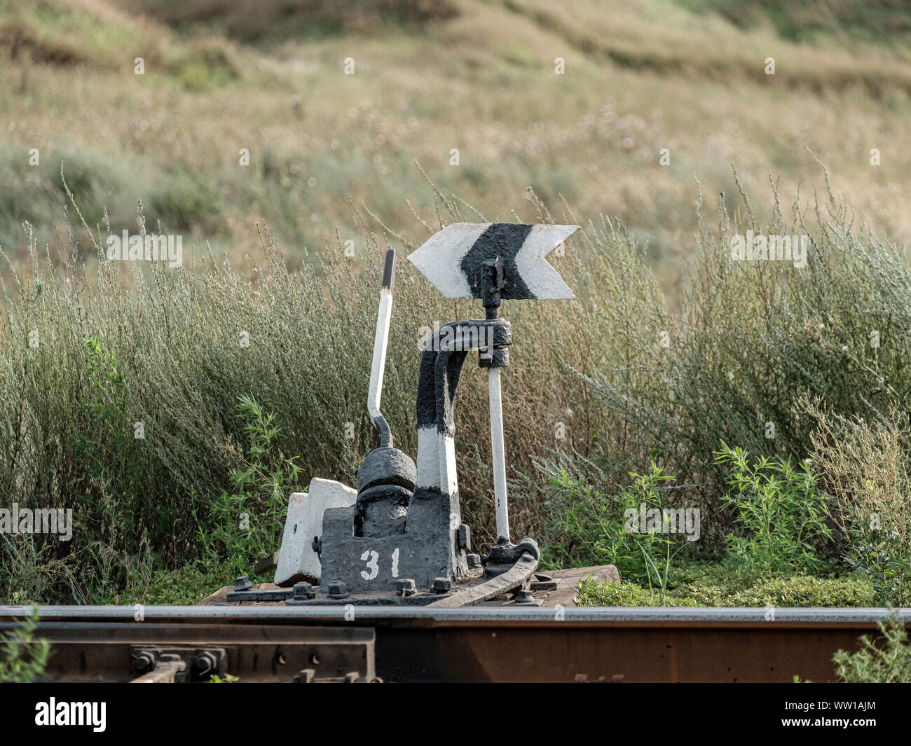 Old railroad arrow switcher. Manual rail switch mechanism. Rudiment and ...