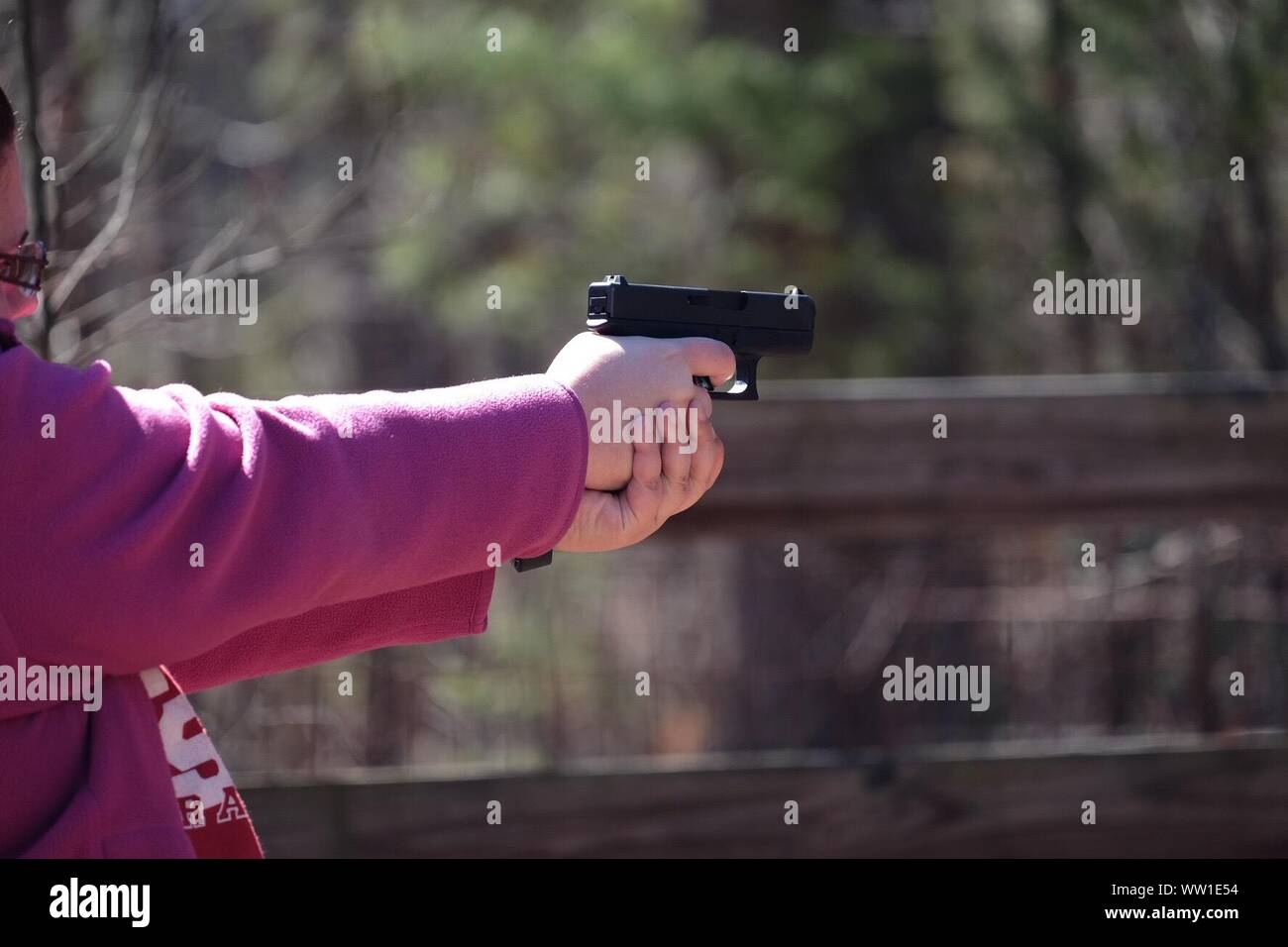 Casual woman handgun hi-res stock photography and images - Alamy
