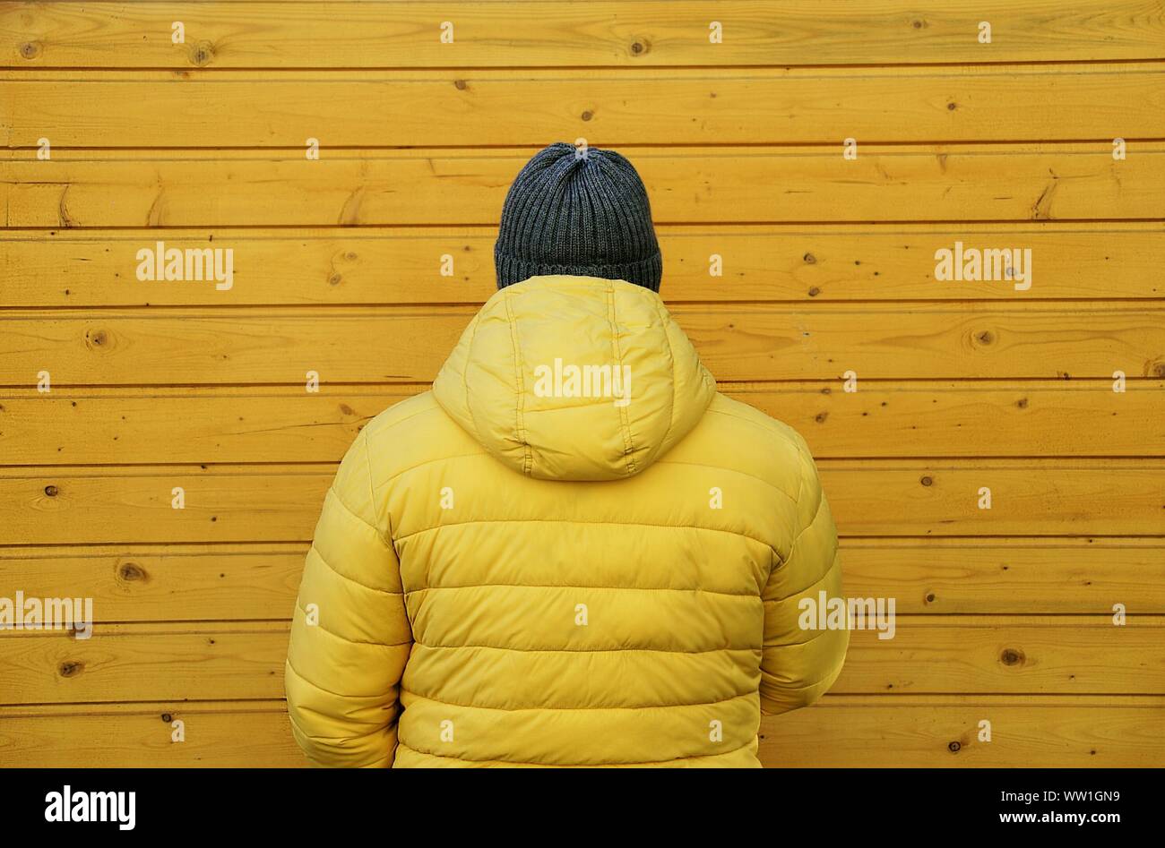 Yellow coat hi-res stock photography and images - Alamy
