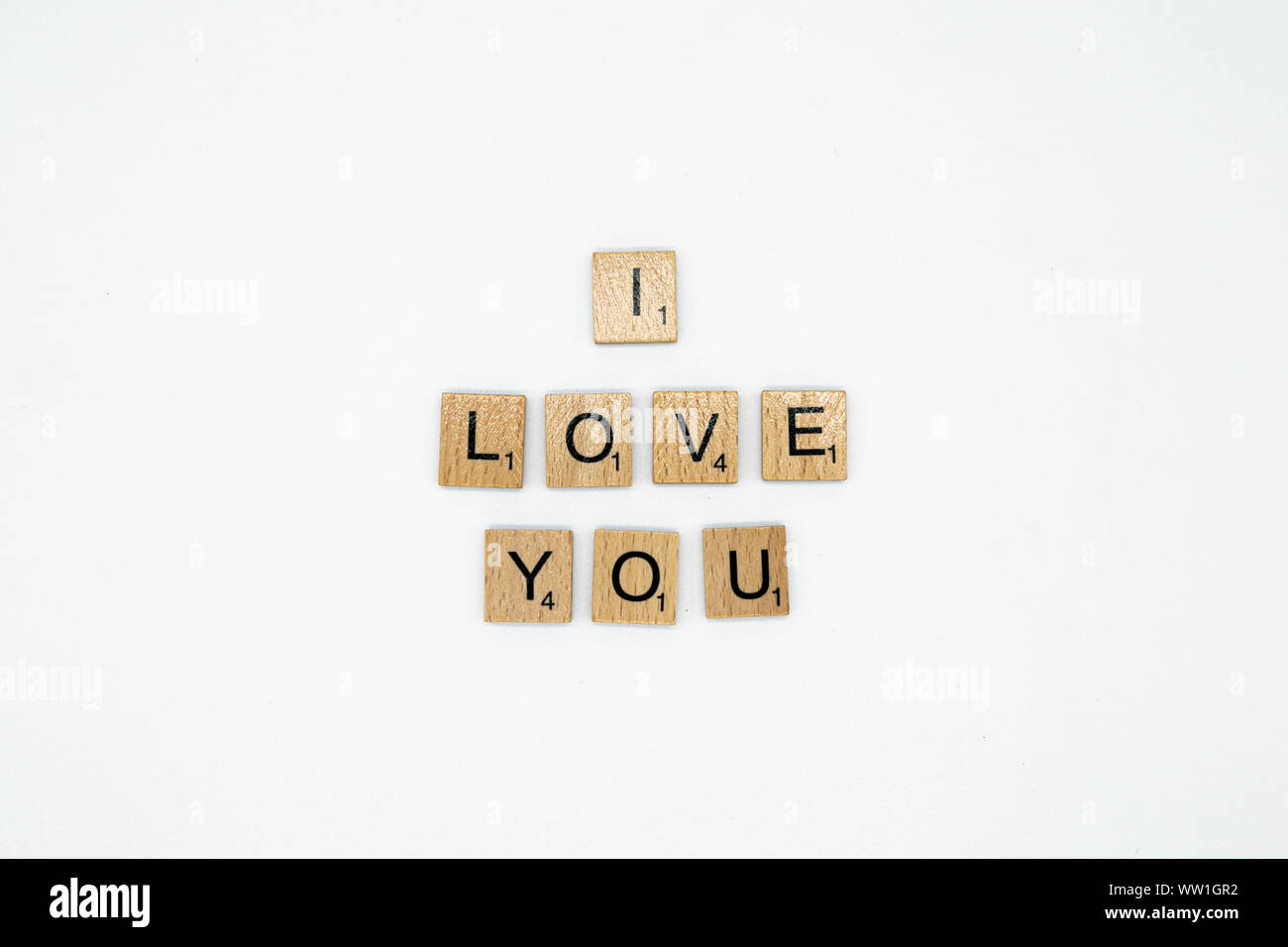I love you on white background spelt in scrabble letters Stock Photo ...