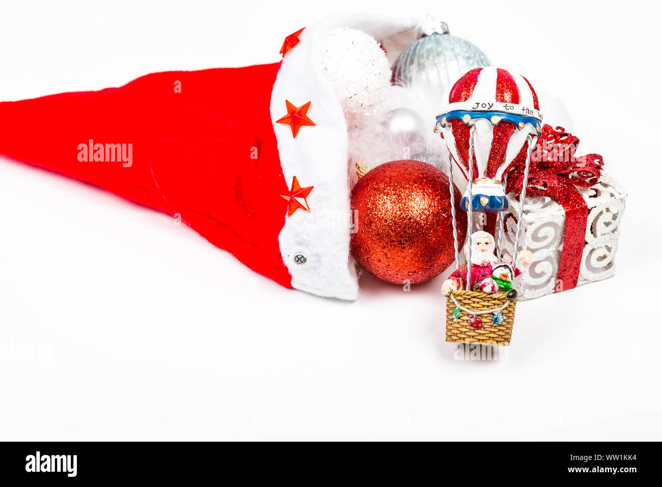 Santa Claus hat cap with Christmas presents and balls ornaments on ...