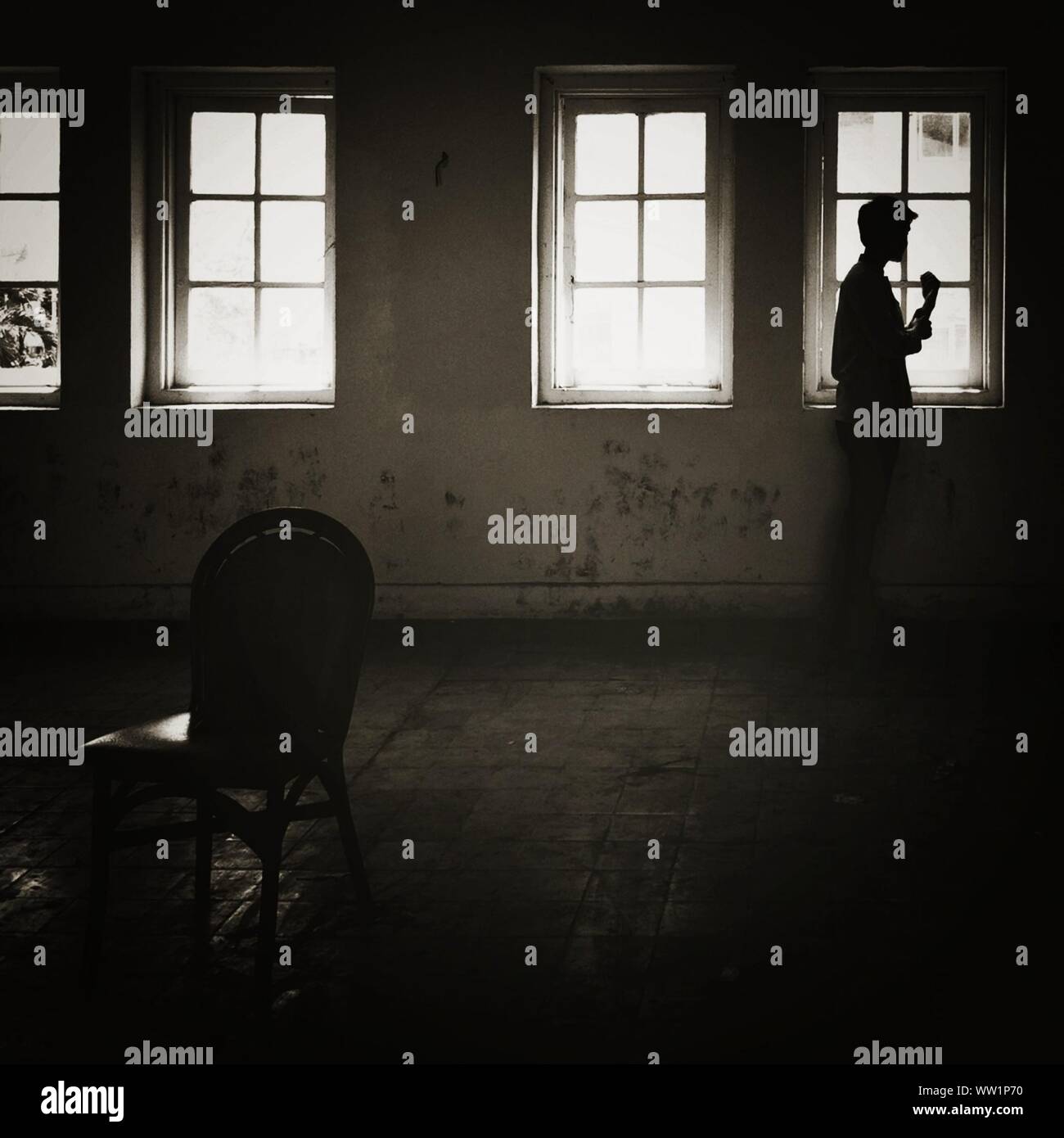 Man in empty room hi-res stock photography and images - Alamy